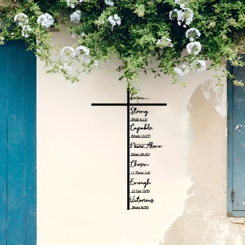 A metal cross wall decoration showcasing crosses and biblical ...